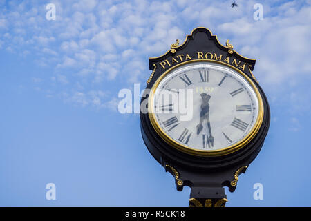 Public clock in Bucharest city, Romania Stock Photo - Alamy