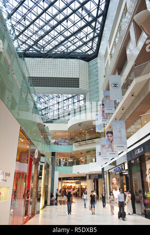 The atrium of Raffles City Shopping Mall, Singapore Stock Photo - Alamy