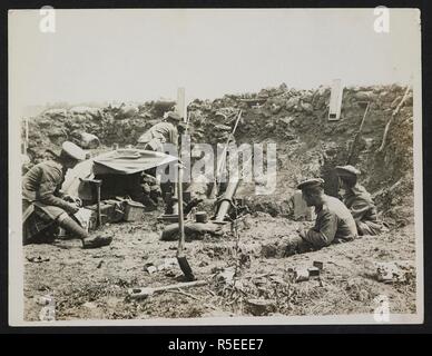 A soldier looking through a periscope during training Stock Photo - Alamy