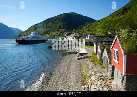 The picturesque village of Utne nestled into a little bay in the ...