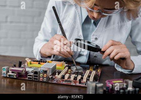 female computer engineer repairing computer Stock Photo - Alamy