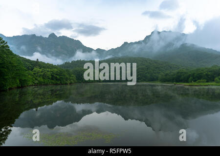 Kagami-ike pond in Nagano Prefecture of Japan. During winter, snow fall ...