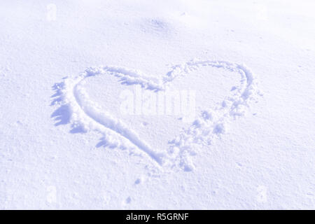 Handwriting heart shaped on snow for texture Stock Photo - Alamy