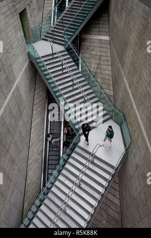 Liverpool city centre Liverpool One escalators and steps as ladies look ...