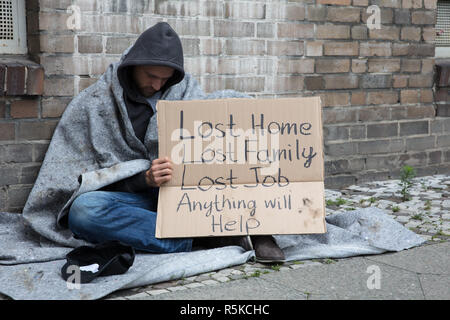 Homeless Man Asking For Job Sitting on Stairway Sidewalk Stock Photo ...