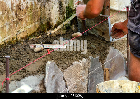 craftsman is working stone slabs Stock Photo - Alamy