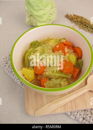Stew with pointed cabbage and millet Stock Photo - Alamy
