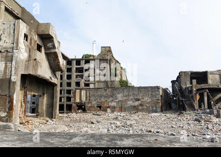 Gunkanjima, Japan is an abandoned coal mining island town off the Stock ...