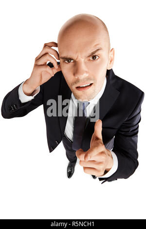 An angry businessman points at the camera Stock Photo - Alamy