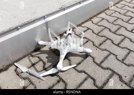 Broken unmanned aerial vehicle, broken drone after crash Stock Photo ...