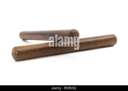 Wooden claves isolated on a white background Stock Photo - Alamy
