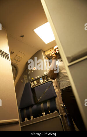 Inside passenger airplane with cockpit door open before takeoff Stock ...