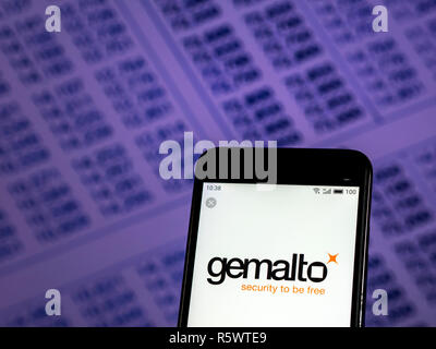 Gemalto Software company logo seen displayed on smart phone Stock Photo ...