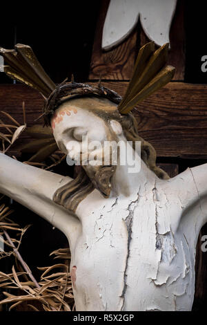 Holy Crucified Jesus Christ close-up. Ancient wooden sculpture Stock Photo - Alamy