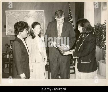 Admin. Atwood presenting general award - Woman receiving award Stock ...