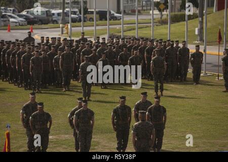 CAMP FOSTER, OKINAWA, Japan – Sgt. Maj. Peter Siaw stands at attention ...