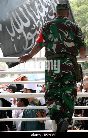 A member of the Indonesian National Armed Forces lands on the Stopdrop ...