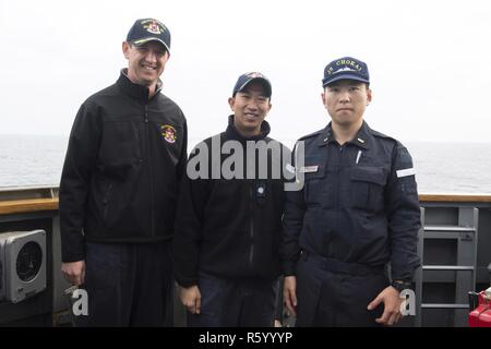 From left, Japanese Navy CDR Kenichi Yamashita, U.S. Navy Command ...