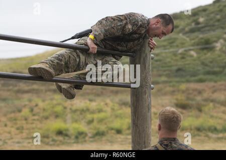 U.S. Marines hike during the Warrant Officer Basic Course (WOBC) 1-23 ...
