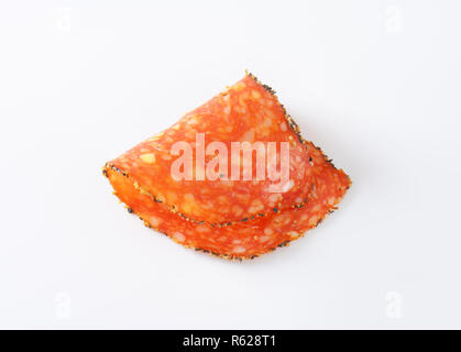 Black pepper-coated salami with cheese Stock Photo - Alamy