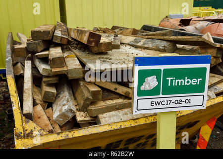 sign on skip at construction site Stock Photo - Alamy