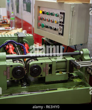 Hydraulic thread rolling machine for industrial metalwork Stock Photo ...
