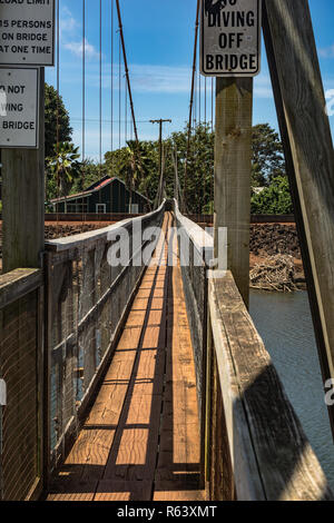 Structure of the historic wooden swinging bridge across the river in ...