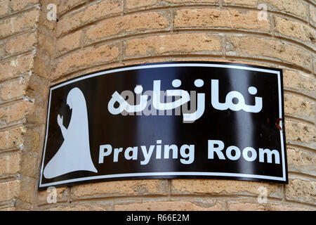 A sign indicating a prayer room for Muslim women, Kuwait City, Kuwait ...