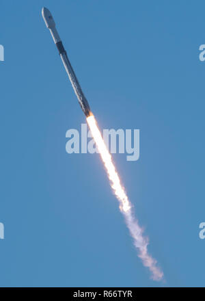 An airman from Vandenberg Air Force Base uses a fog spray on a ...