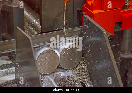 Hacksaw machine on cutting for round steel Stock Photo - Alamy