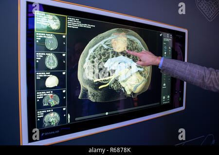 04 December 2018, Bavaria, Nürnberg: An employee of the German company ...