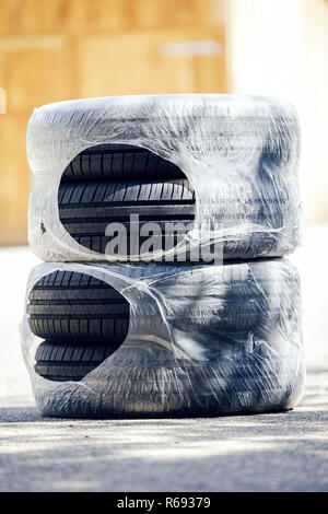 Summer Tires Wrapped In Foil Stock Photo - Alamy