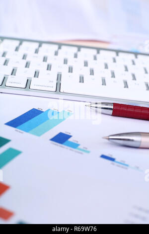 Picture of graph paper, pen and keyboard Stock Photo - Alamy