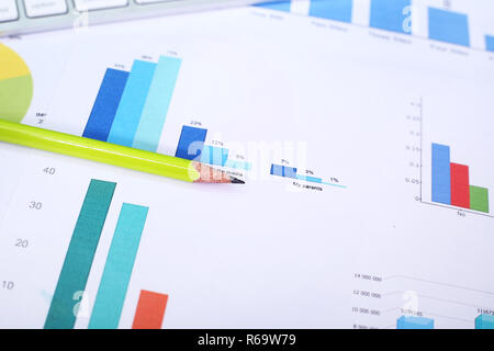 Picture of keyboard and pencil on the graph paper Stock Photo - Alamy