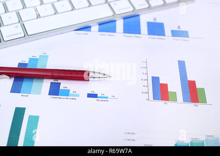 Picture of graph paper, pen and keyboard Stock Photo - Alamy