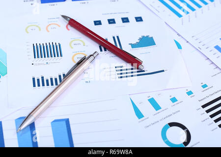 Portrait of graph paper, two pen and keyboard Stock Photo - Alamy