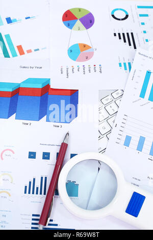 Picture of bar graph paper, pen and keyboard Stock Photo - Alamy