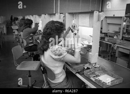 The production of electronic devices by female employees at Siemens on ...