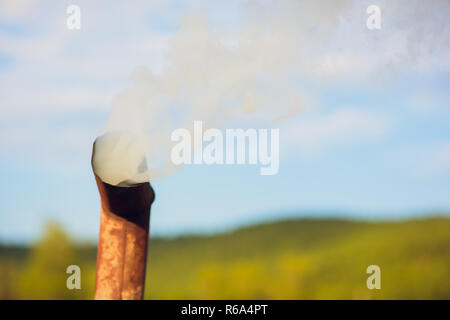 Pipes with smoke from samovar. Russian traditions Stock Photo - Alamy