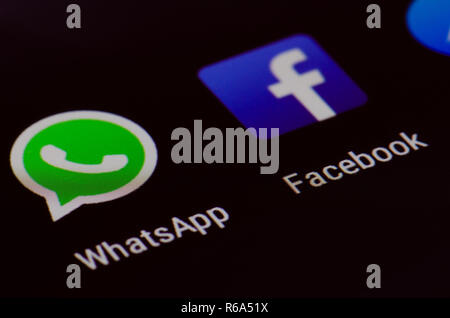 Facebook and Whatsapp icon on monitor screen. Two of the biggest social ...