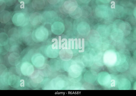 Turquoise colored abstract background with bokeh, for the new year and ...