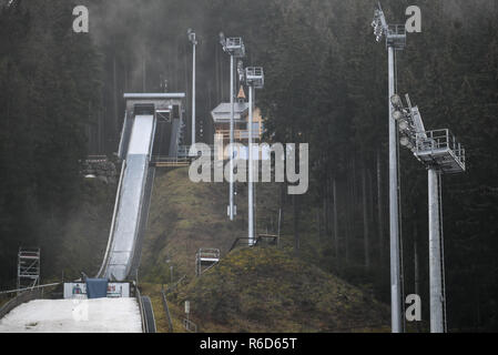 Titisee Neustadt, Germany. 05th Dec, 2018. A tarpaulin covers the inrun ...