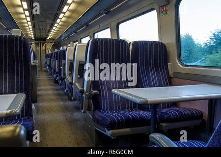 Seating inside an empty Northern railway carriage interior, England, UK ...