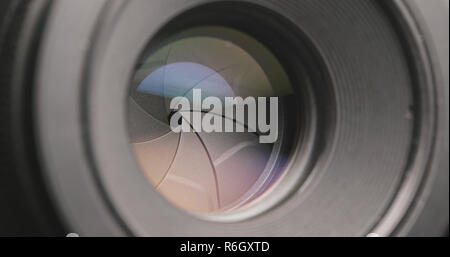 Camera lens zooming in and out Stock Photo - Alamy