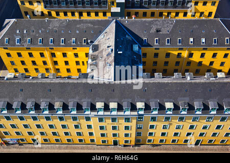 A high angle shot of yellow painted lines on the ground in the street ...