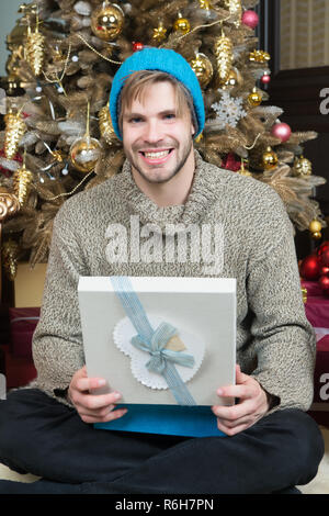 Christmas Eve. happy bearded man hipster wear red festive elf costume ...