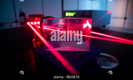 Experiment with red laser in optics lab Stock Photo - Alamy