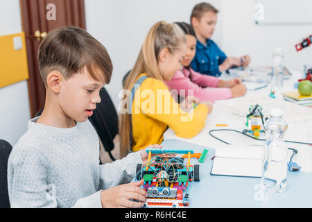 focused children working together on STEM project in classrom Stock ...