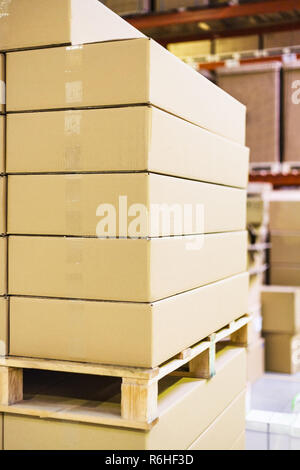 The cartons with loading into of container Stock Photo - Alamy