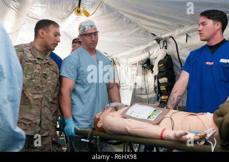 (Left to Right) Col. Imad Haque, general surgeon at Madigan Army ...